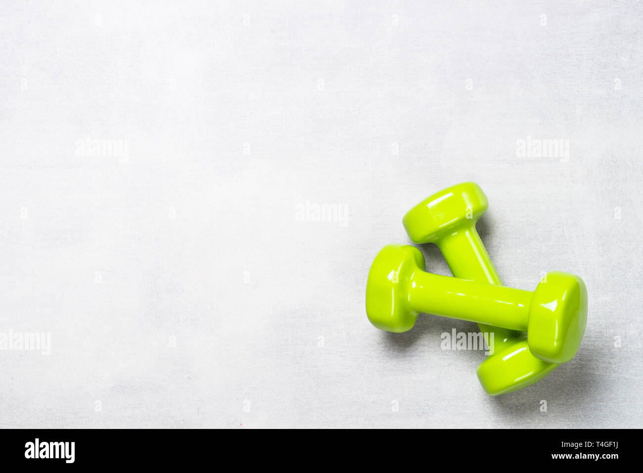 Dumbbells on white background top view Stock Photo - Alamy