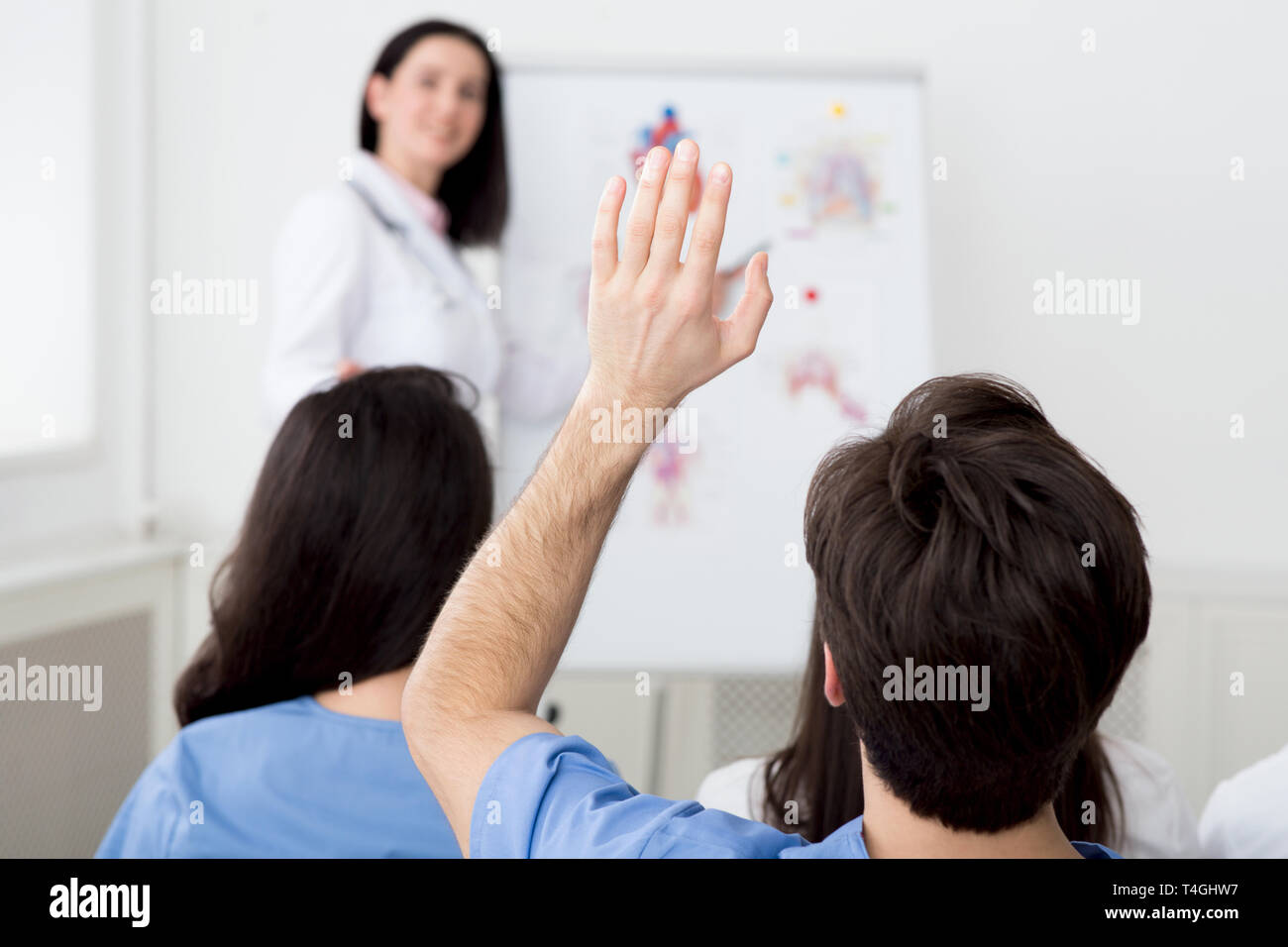 Medical lecture. Doctor giving presentation to practitioners Stock ...