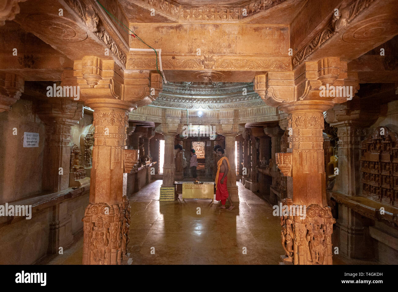 Holy man near a idol in Chandraprabhu Jain Temple jaisalmer, Rajasthan ...