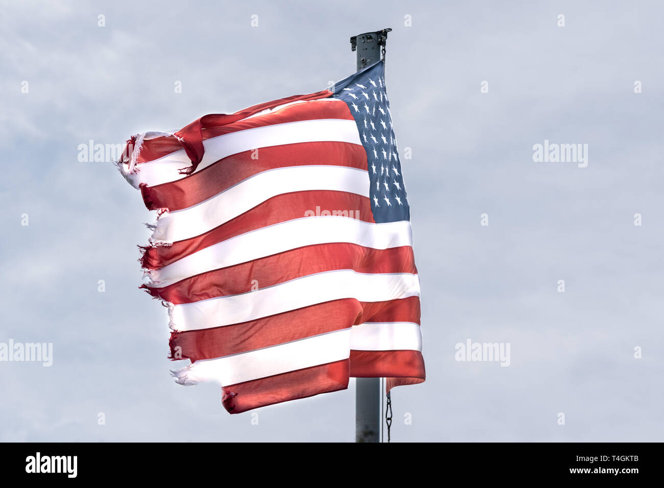 Ripped torn tattered american flag hi-res stock photography and images ...