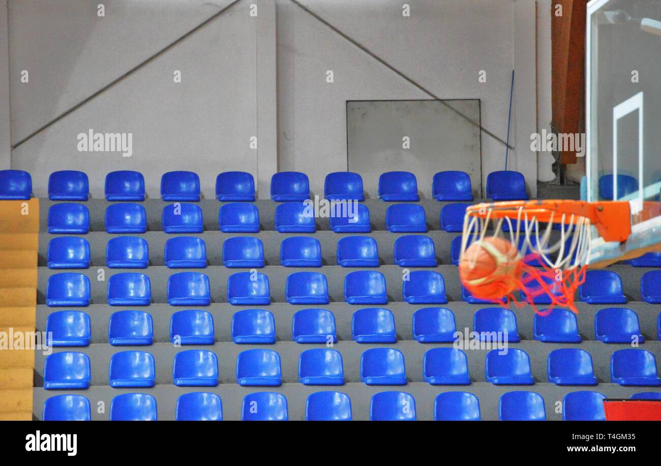A basketball ball and a basket Stock Photo - Alamy