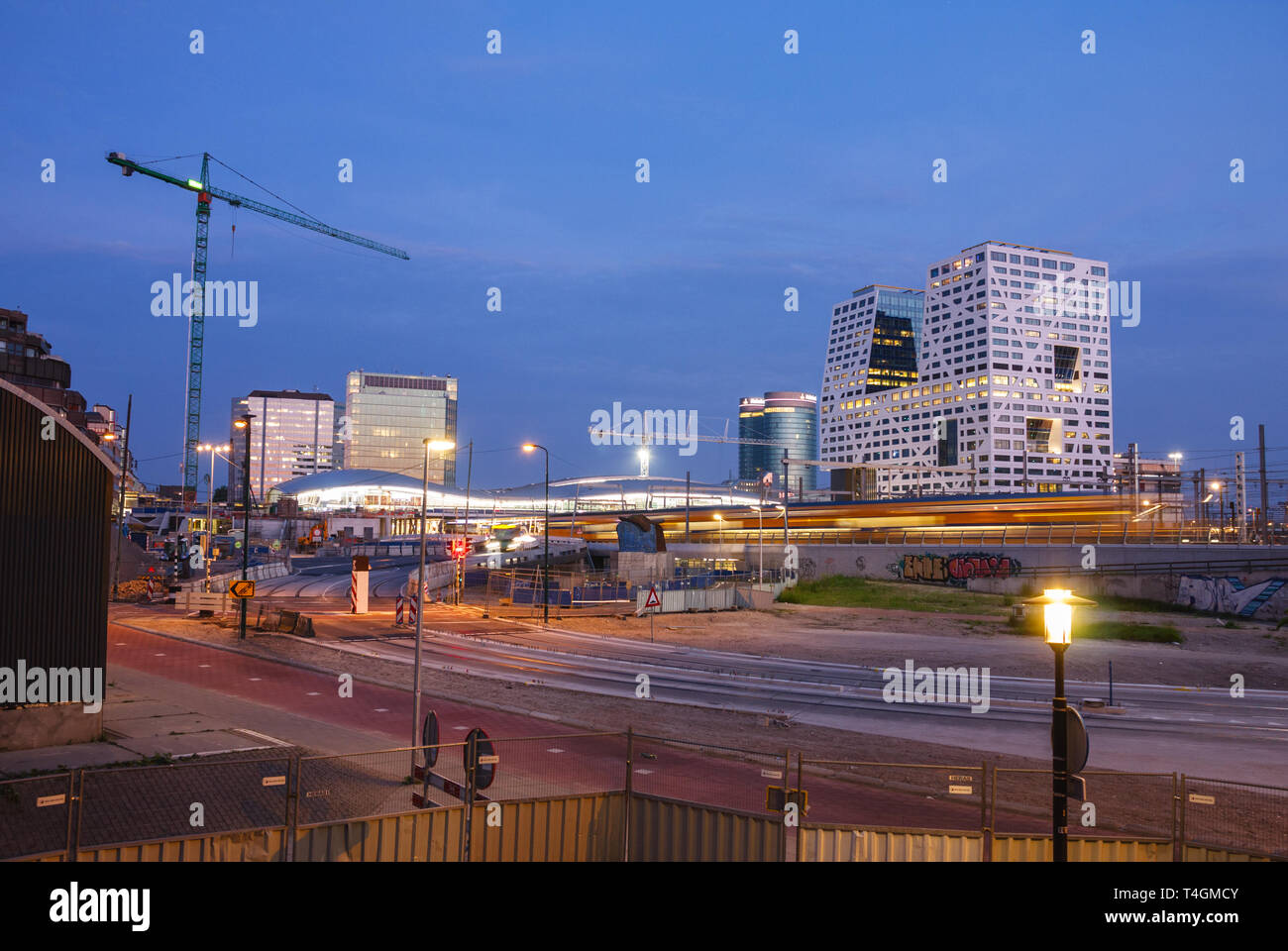 NS Headquarters, Utrecht Centraal Station with a moving train, the city ...