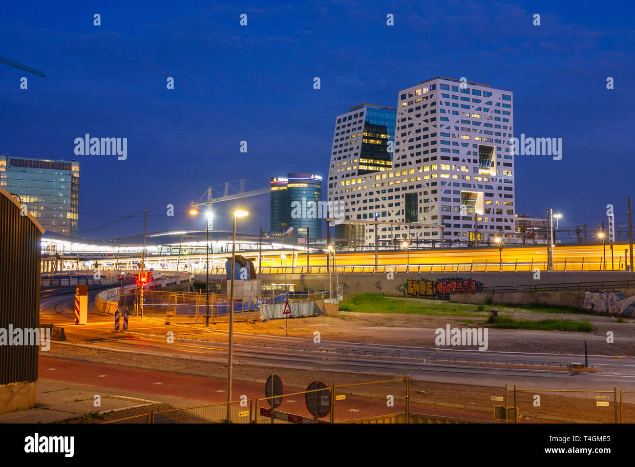 NS Headquarters, Utrecht Centraal Station with a moving train, the city ...
