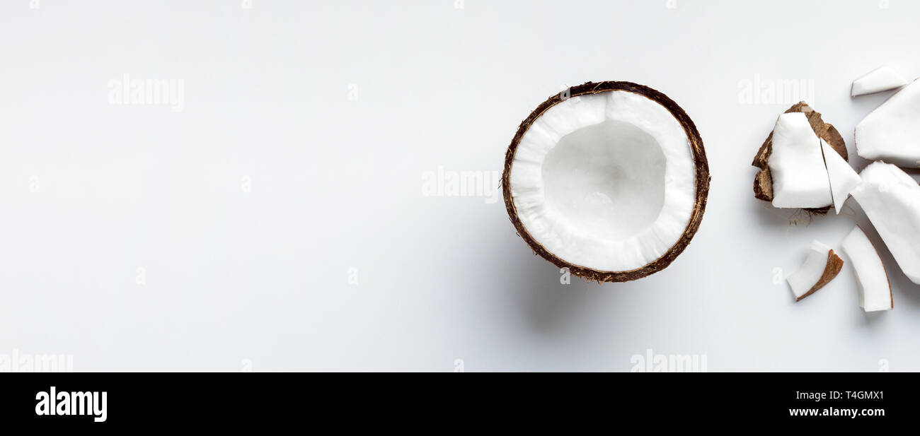 Chopped coconut on white Stock Photo - Alamy