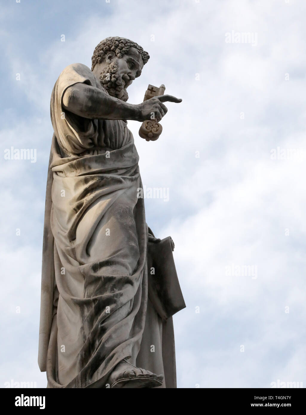 statue of Saint Peter with keys on the hand in the main square of the ...