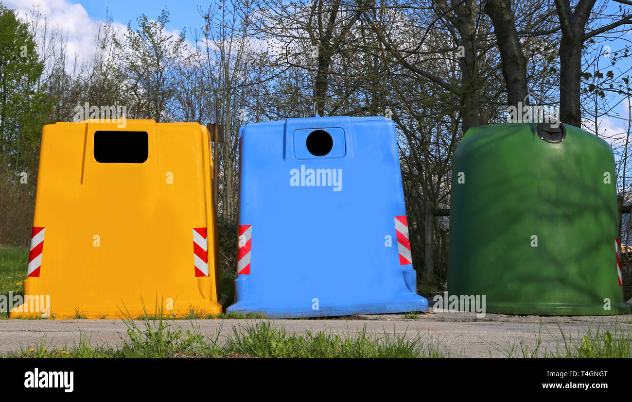 three bins for waste paper collection and for the collection of used ...