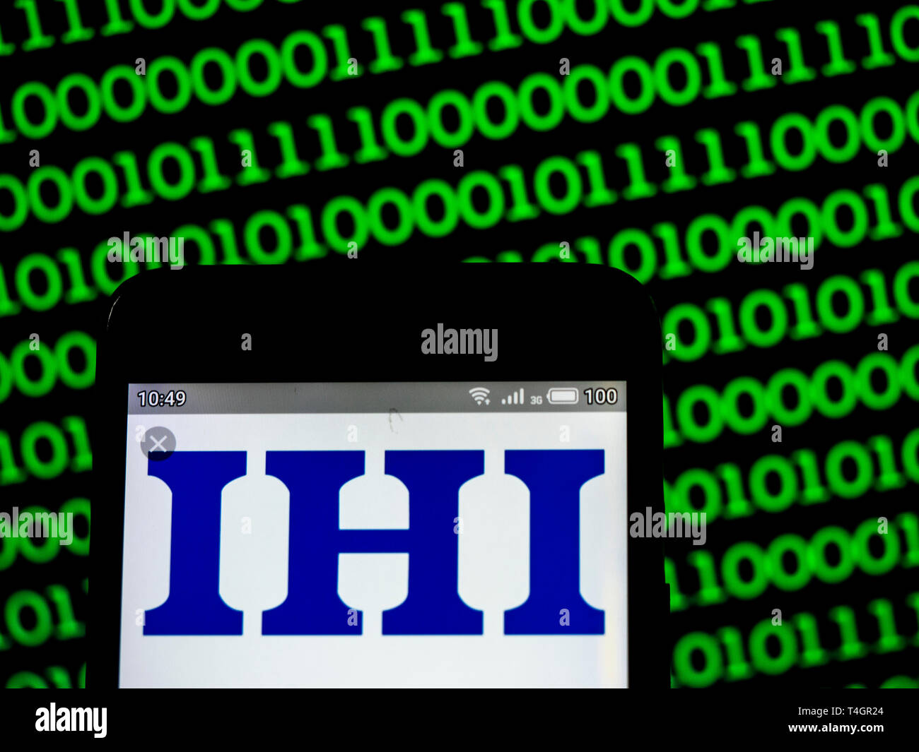 In this photo illustration a IHI Corporation logo seen displayed on a ...