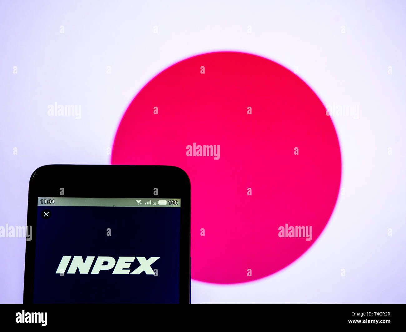 In this photo illustration a INPEX Corporation logo seen displayed on a ...
