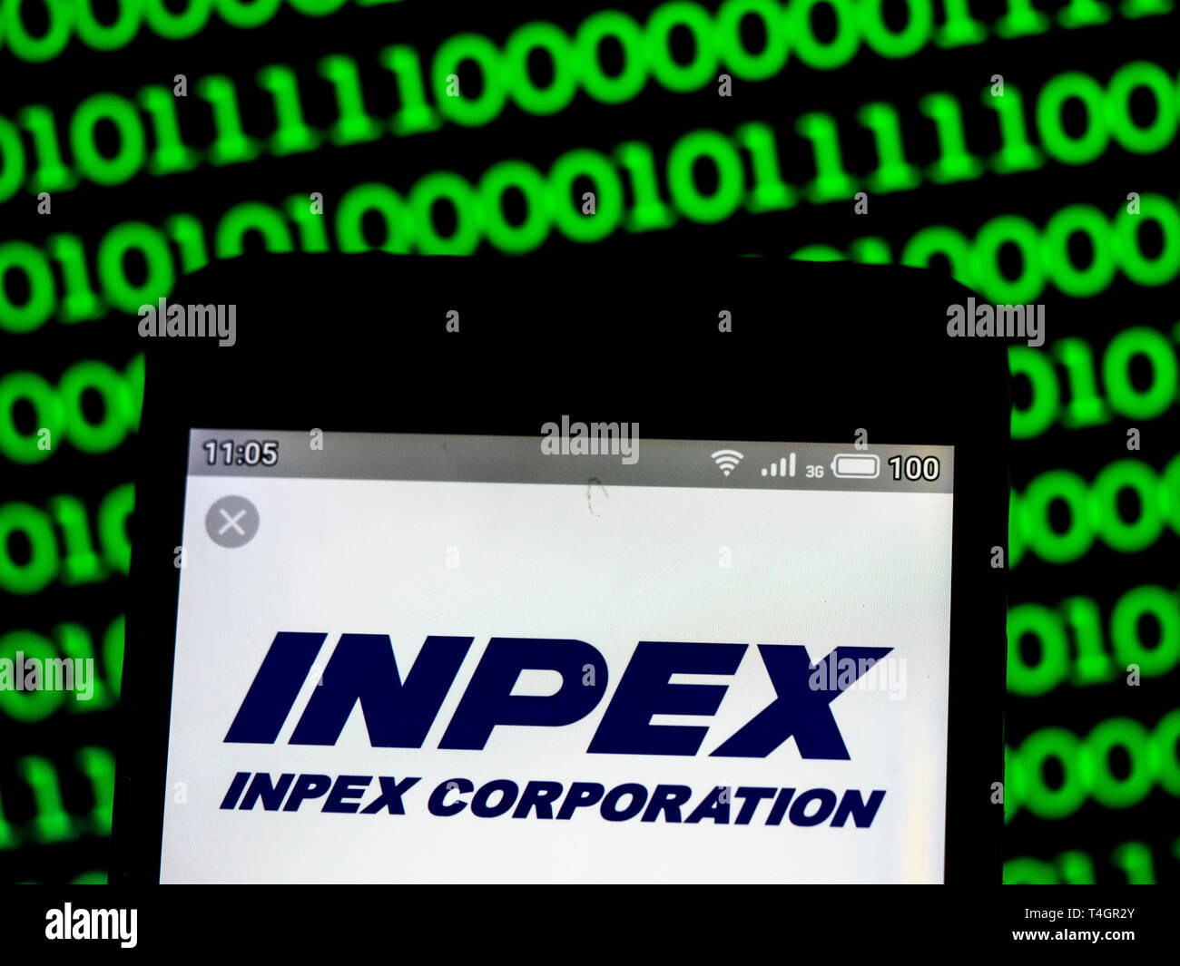 In this photo illustration a INPEX Corporation logo seen displayed on a ...