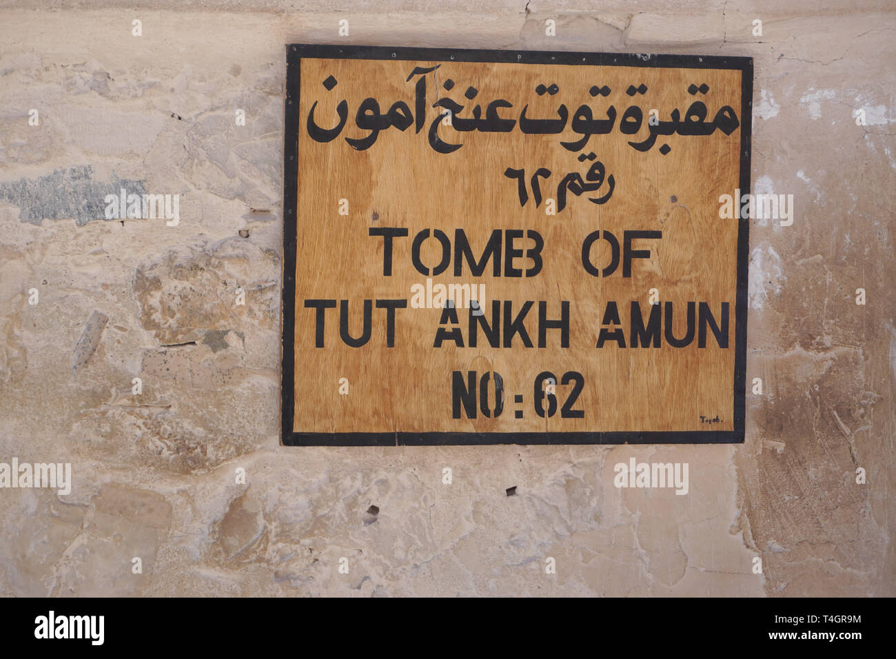 Luxor, Egypt: A plain wooden sign in Arabic and English indicates Tomb ...