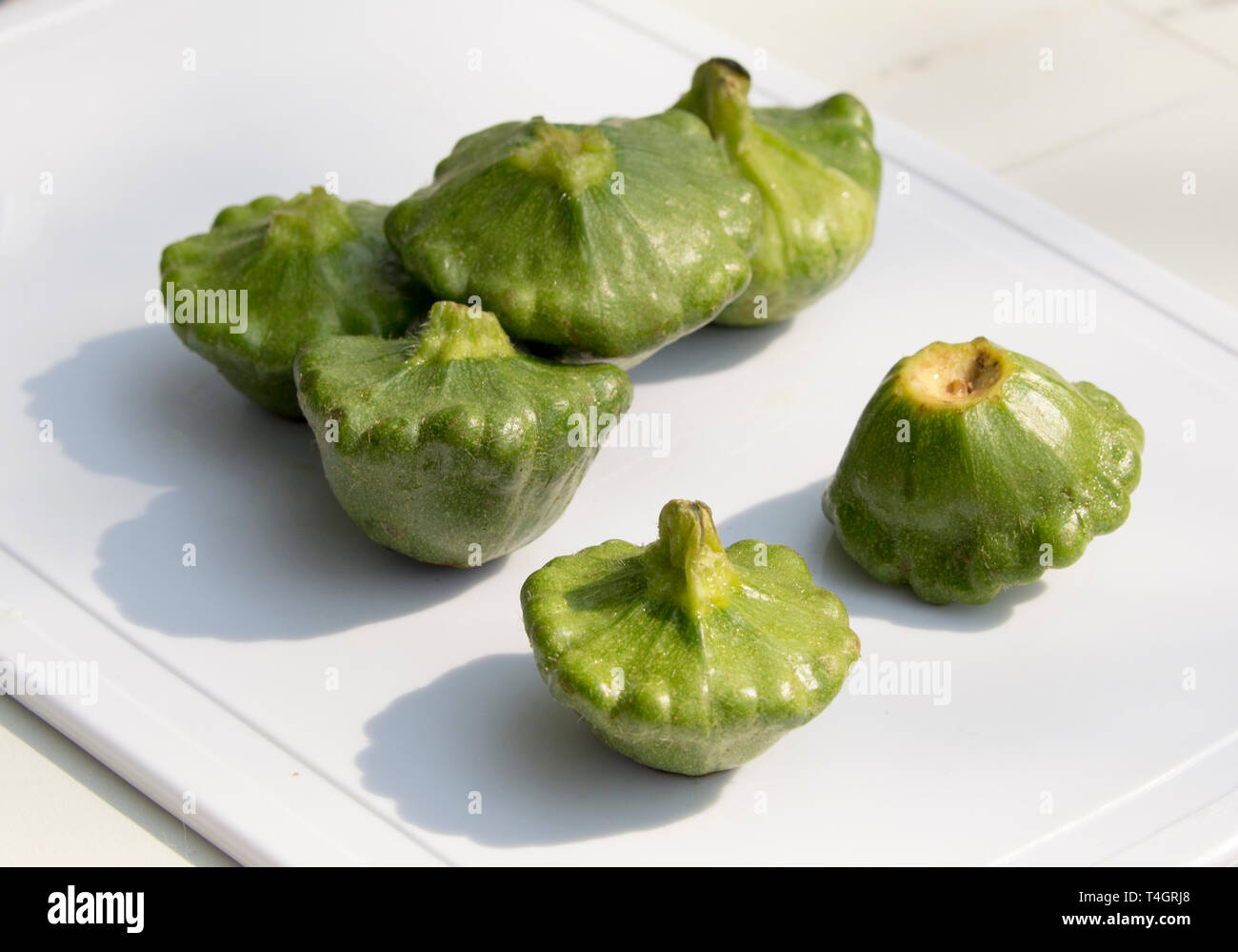 pattipan vegetable close up on white background Stock Photo - Alamy