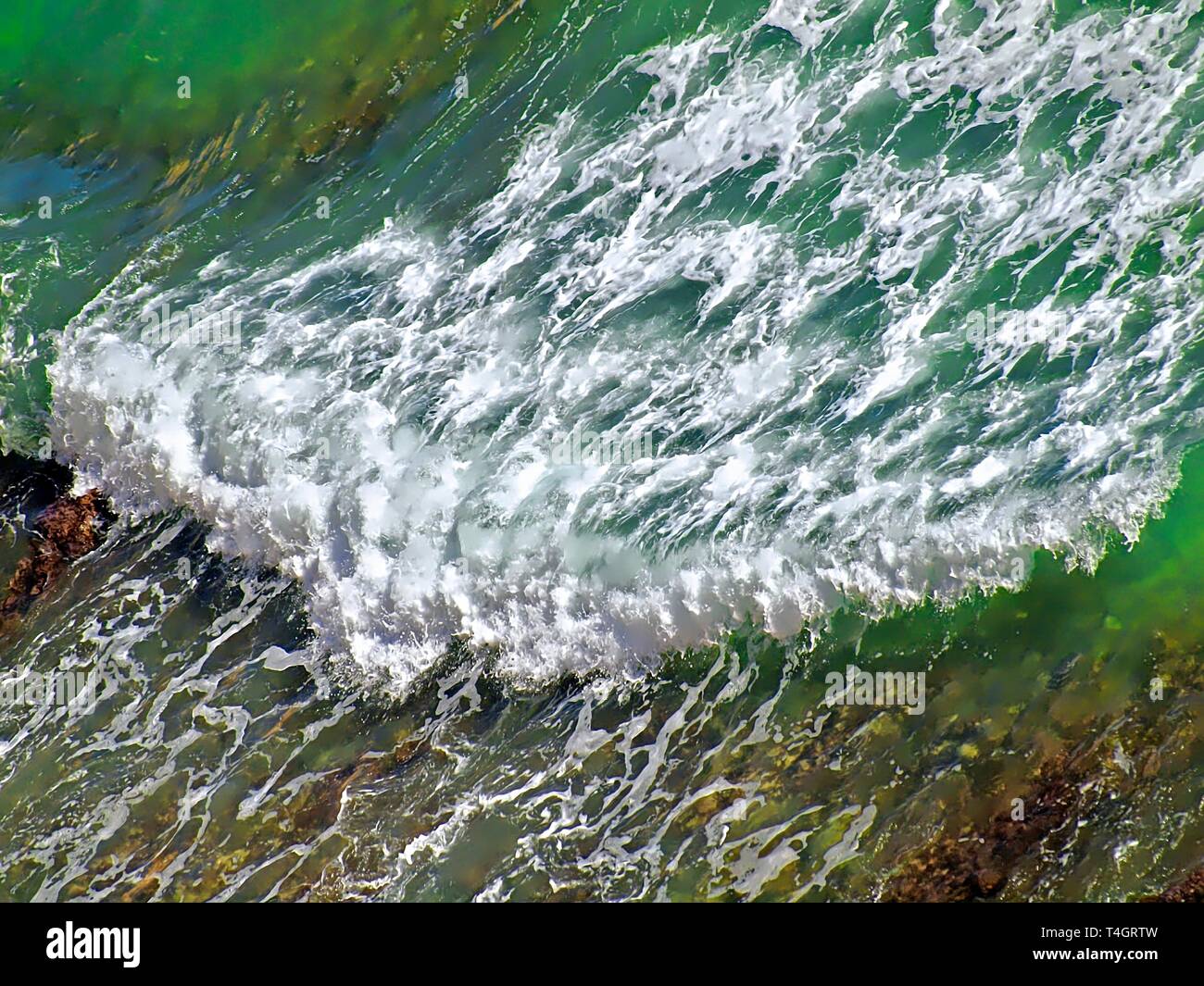 Beautiful and colorful waves in the ocean Stock Photo - Alamy