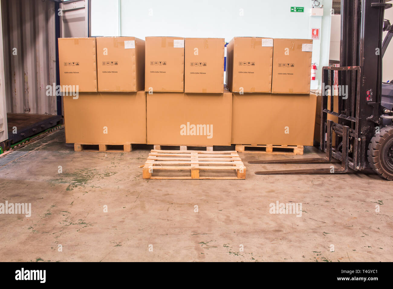 The forklift loading pallet with a forklift into a truck Stock Photo ...