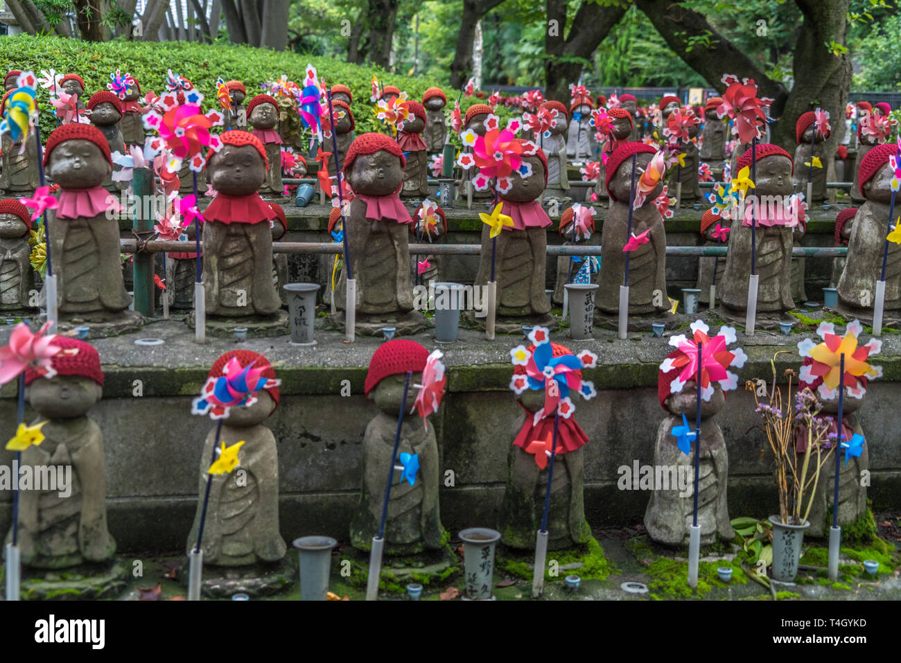 Senda Kosodate Jizo Son. Small statues of Jizo. Tthe Buddhist god ...