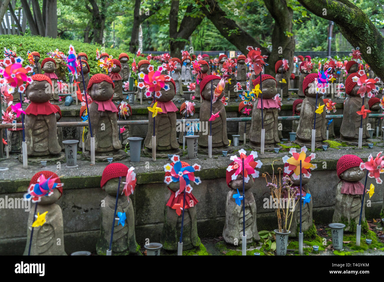 Senda Kosodate Jizo Son. Small statues of Jizo. Tthe Buddhist god ...