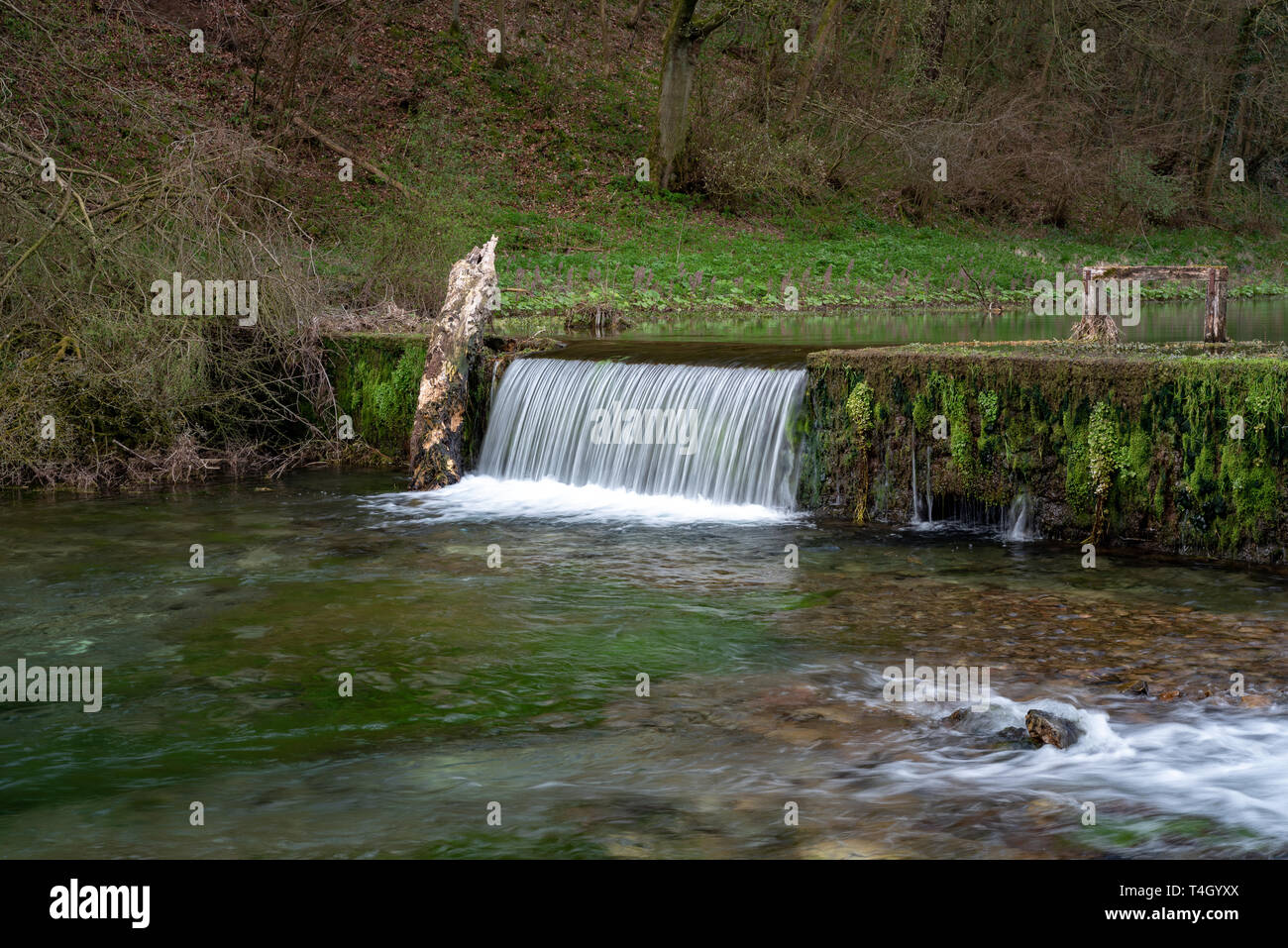 Flowing water, and waterfall cascades on the River Lathkill, Lathkill ...
