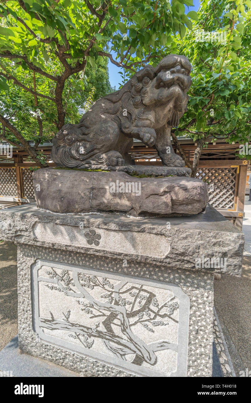 Komainu at Yushima Tenmangu or Yushima Tenjin. Shinto Shrine devoted to ...