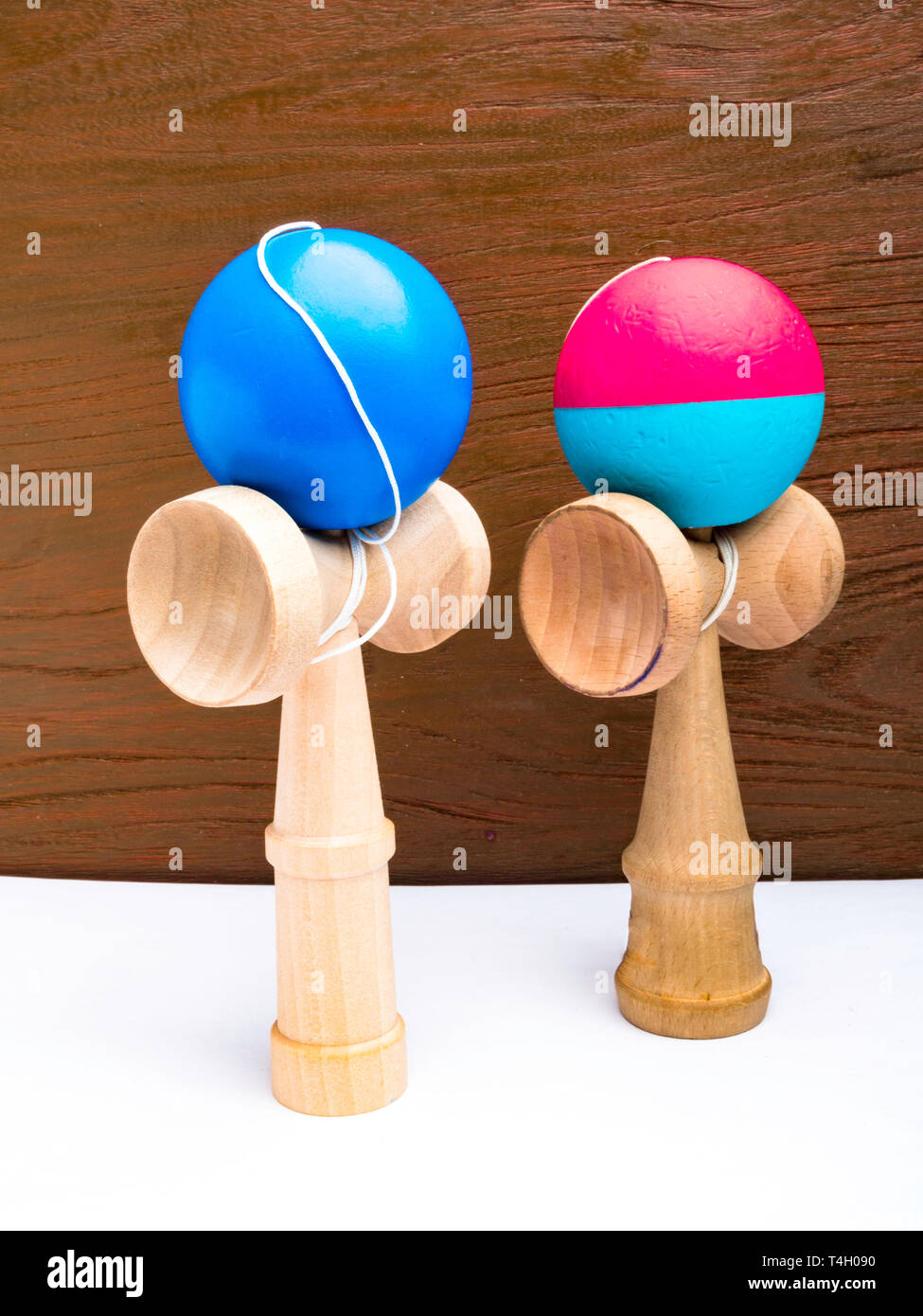 Classic Japanese game kendama on wooden background. Wooden playing ...