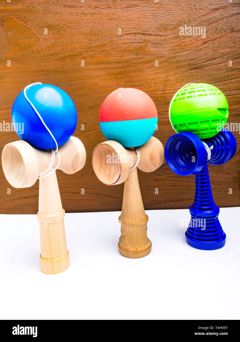 Classic Japanese game kendama on wooden background. Wooden playing ...