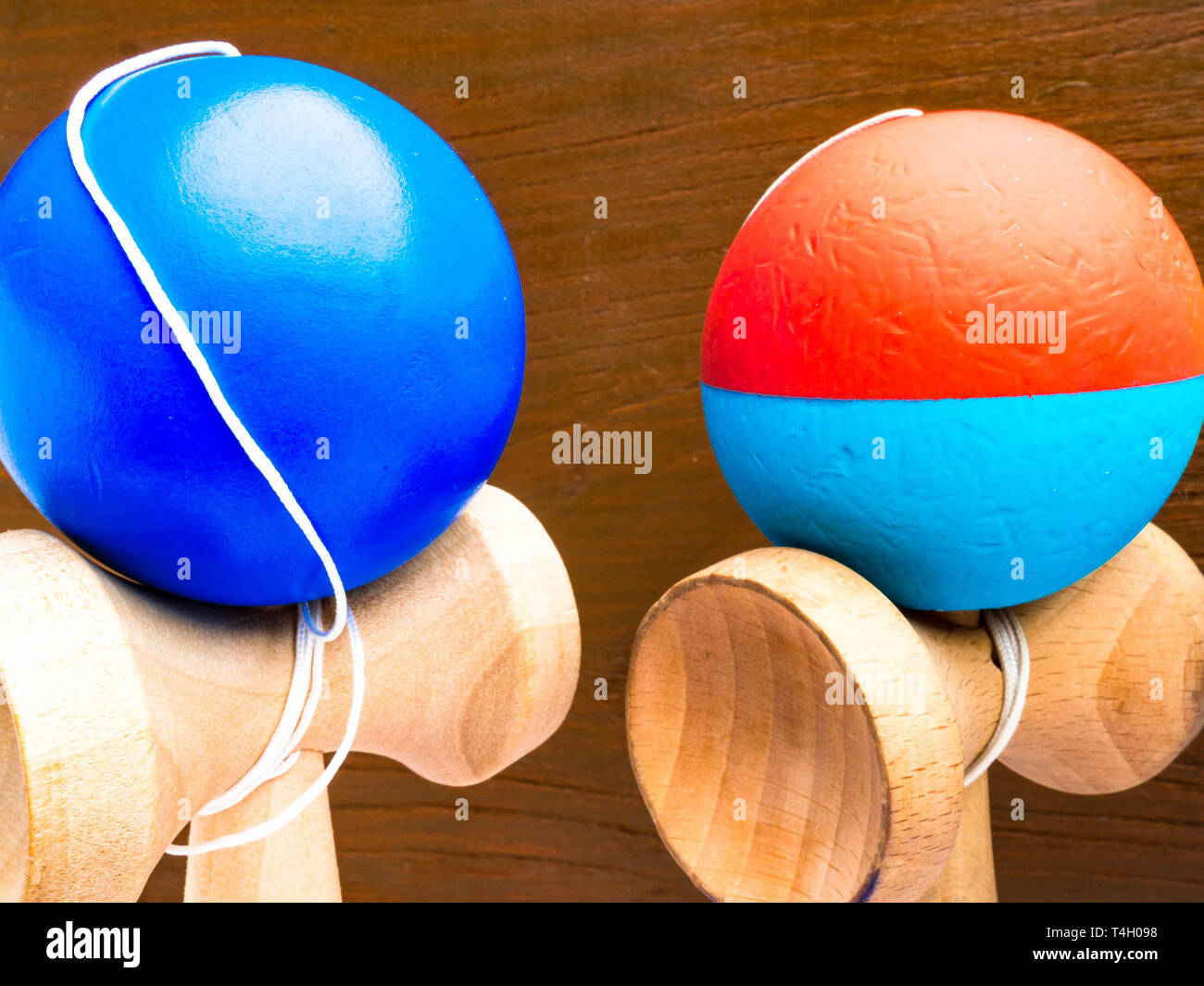 Classic Japanese game kendama on wooden background. Wooden playing ...