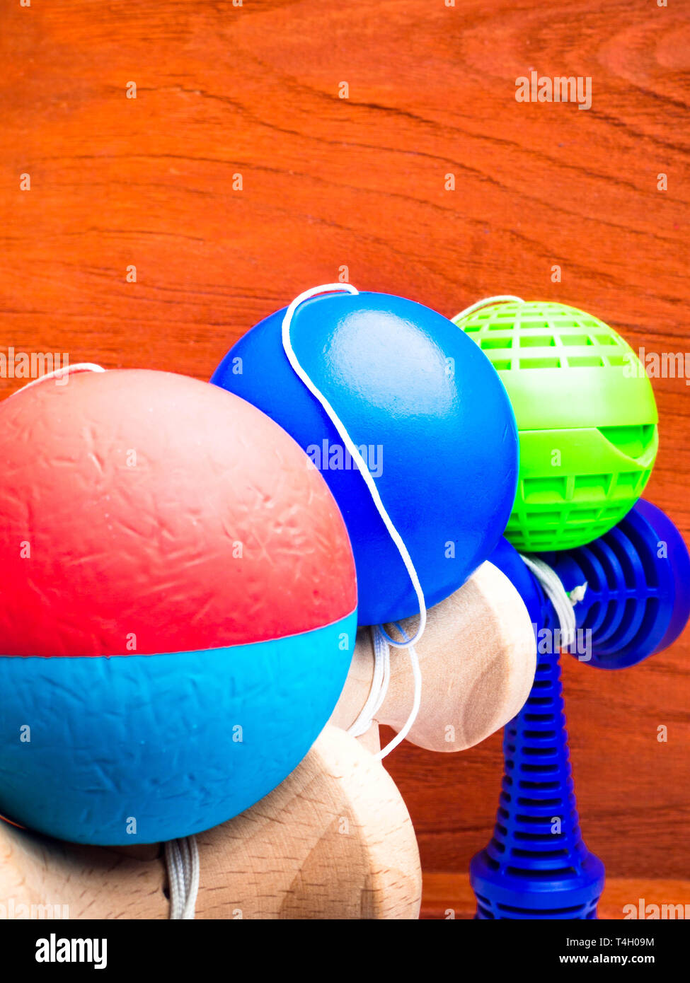 Classic Japanese game kendama on wooden background. Wooden playing ...