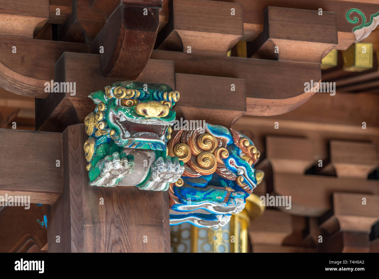 Shishi (Lion Guardian) at Honden (Main Hall) of Yushima Tenmangu or ...