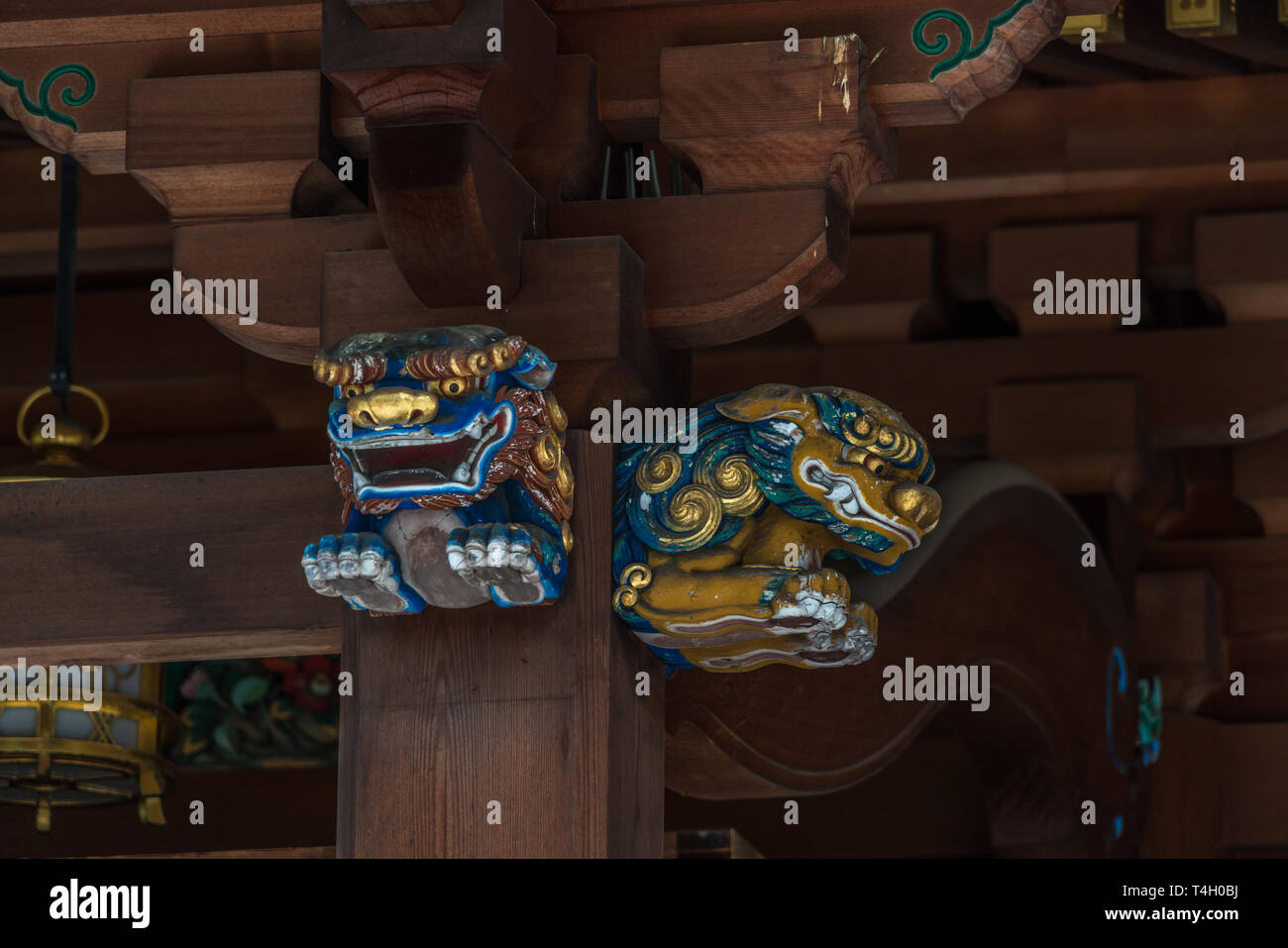 Shishi (Lion Guardian) at Honden (Main Hall) of Yushima Tenmangu or ...