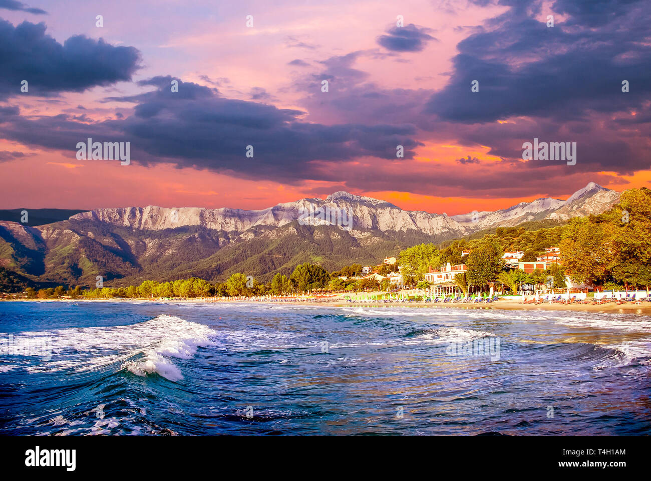 Stunning sunset at Psili Ammos beach, Thassos island, Greece. It is ...