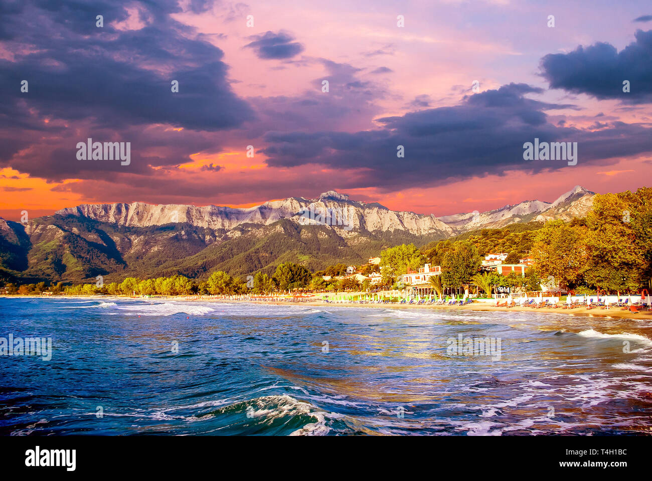 Stunning sunset at Psili Ammos beach, Thassos island, Greece. It is ...