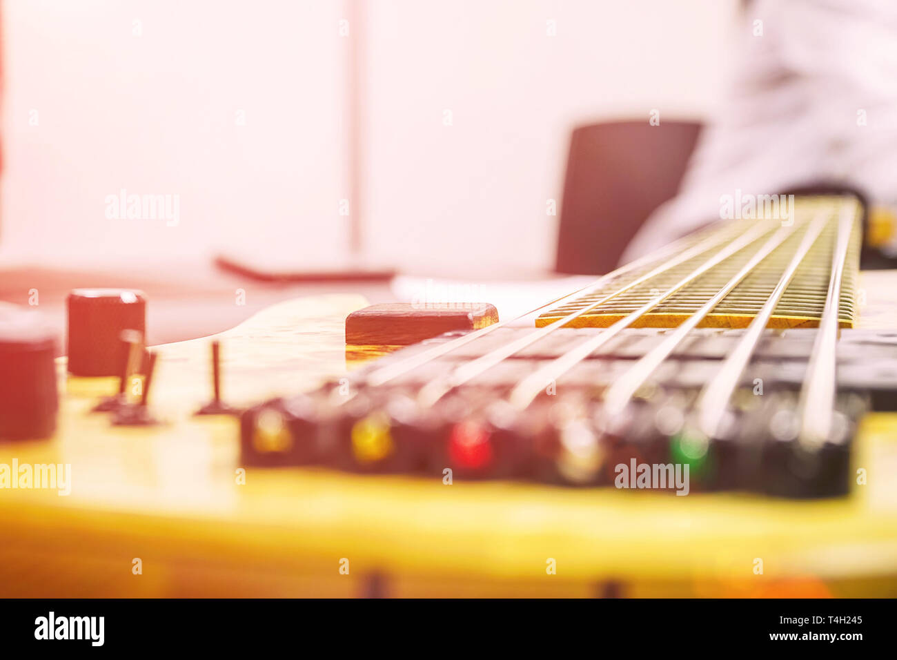 Modern Electric six-string bass guitar Stock Photo - Alamy