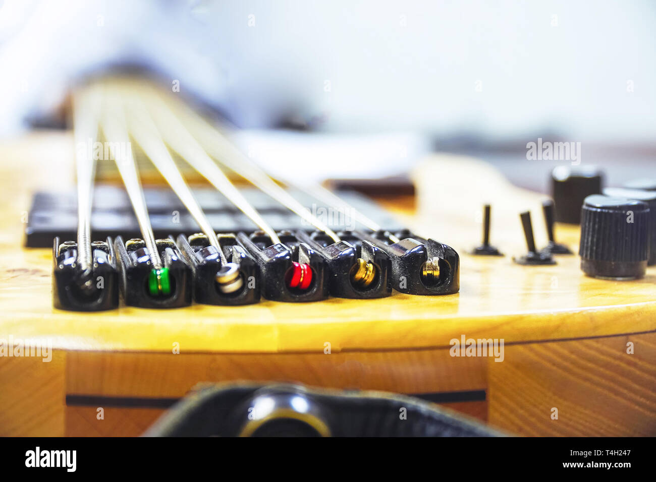 Modern Electric six-string bass guitar Stock Photo - Alamy