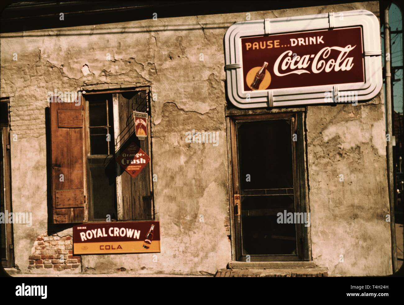 a rustic shop branded with coca cola Stock Photo - Alamy