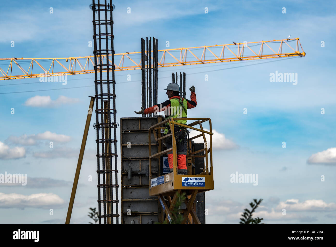 construction workers on high rise building Stock Photo - Alamy