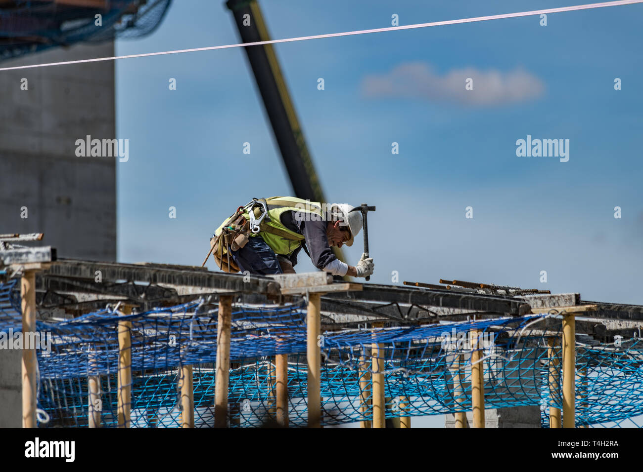 construction workers on high rise building Stock Photo - Alamy