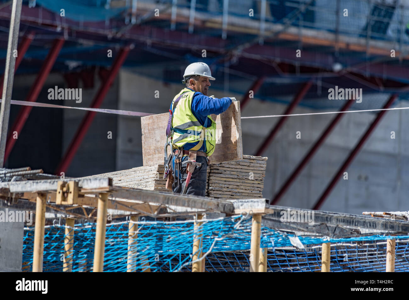 construction workers on high rise building Stock Photo - Alamy
