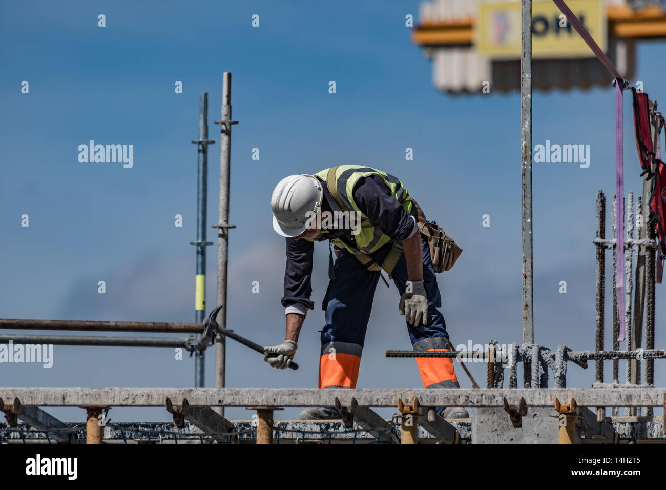 construction workers on high rise building Stock Photo - Alamy