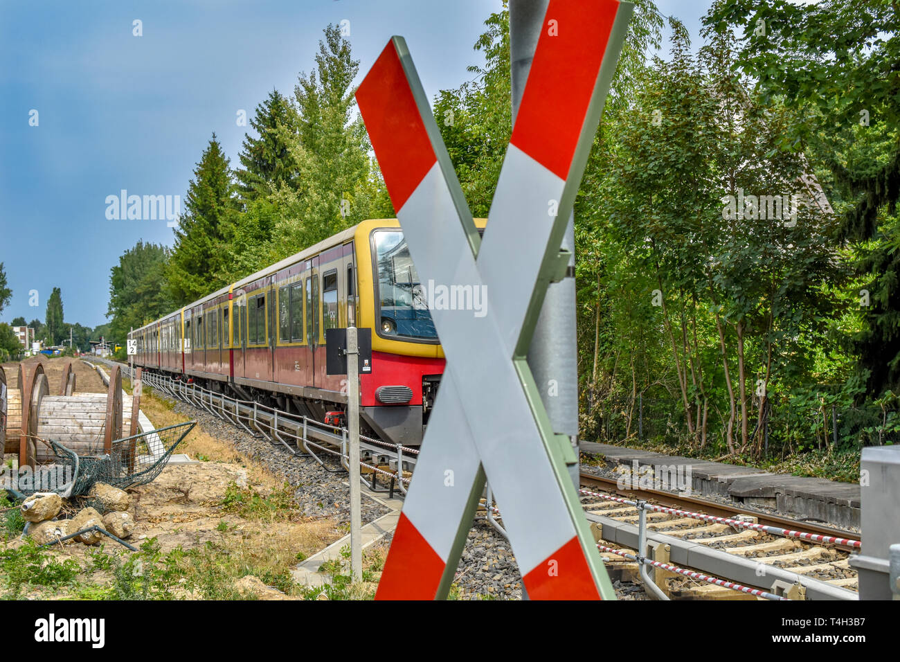 Berlin, Germany - July 22, 2018: Unfocussed traffic sign at a railroad ...