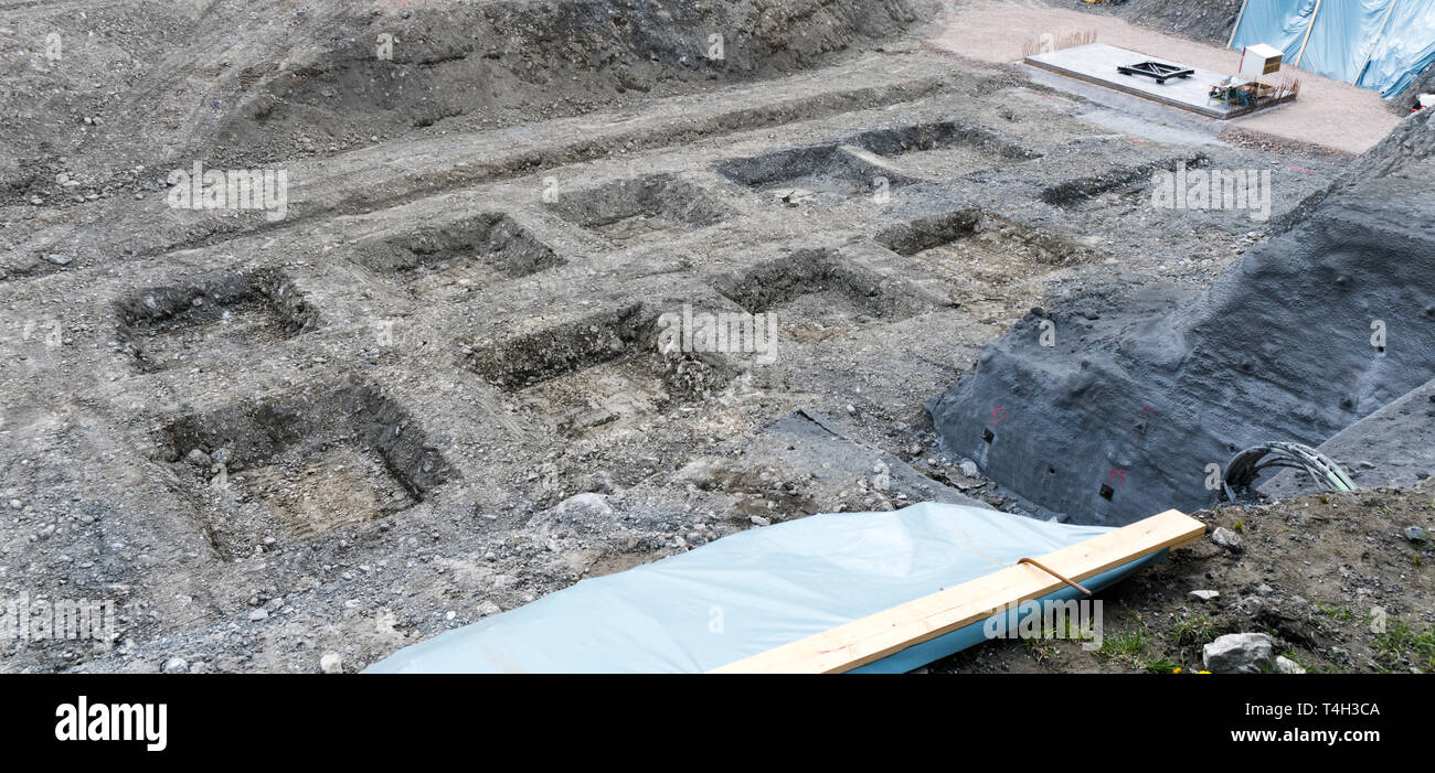 A view of an excavation site for a new building with special foundation ...