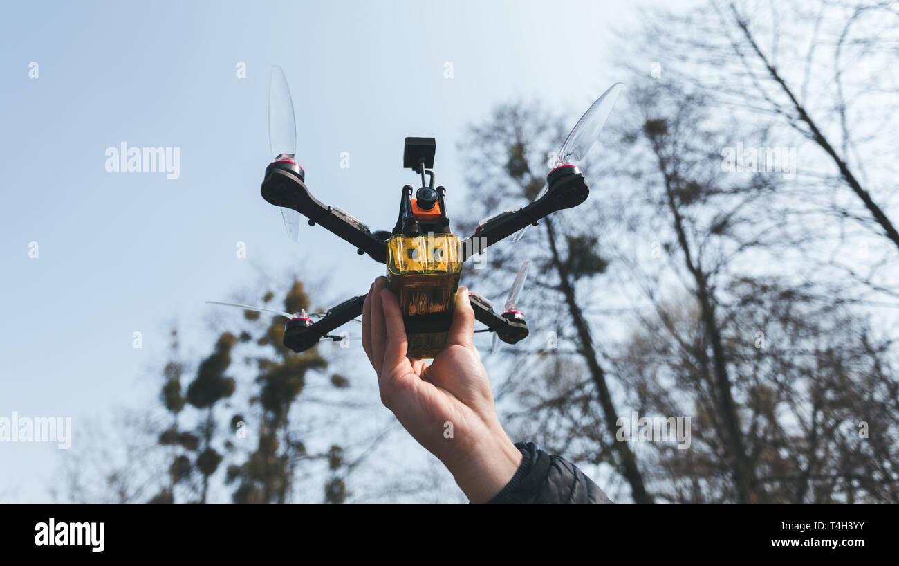 Man holds in his hand fpv copter Stock Photo - Alamy