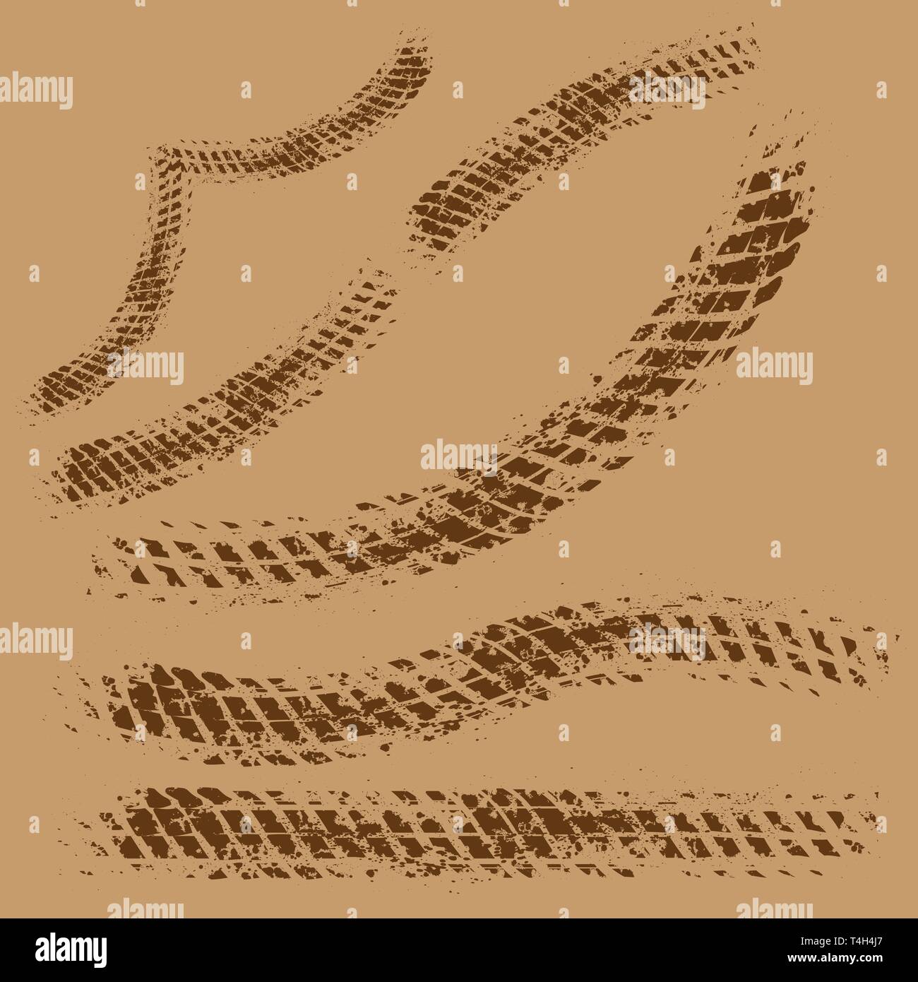 Dark grunge tire tracks different forms isolated on brown background ...