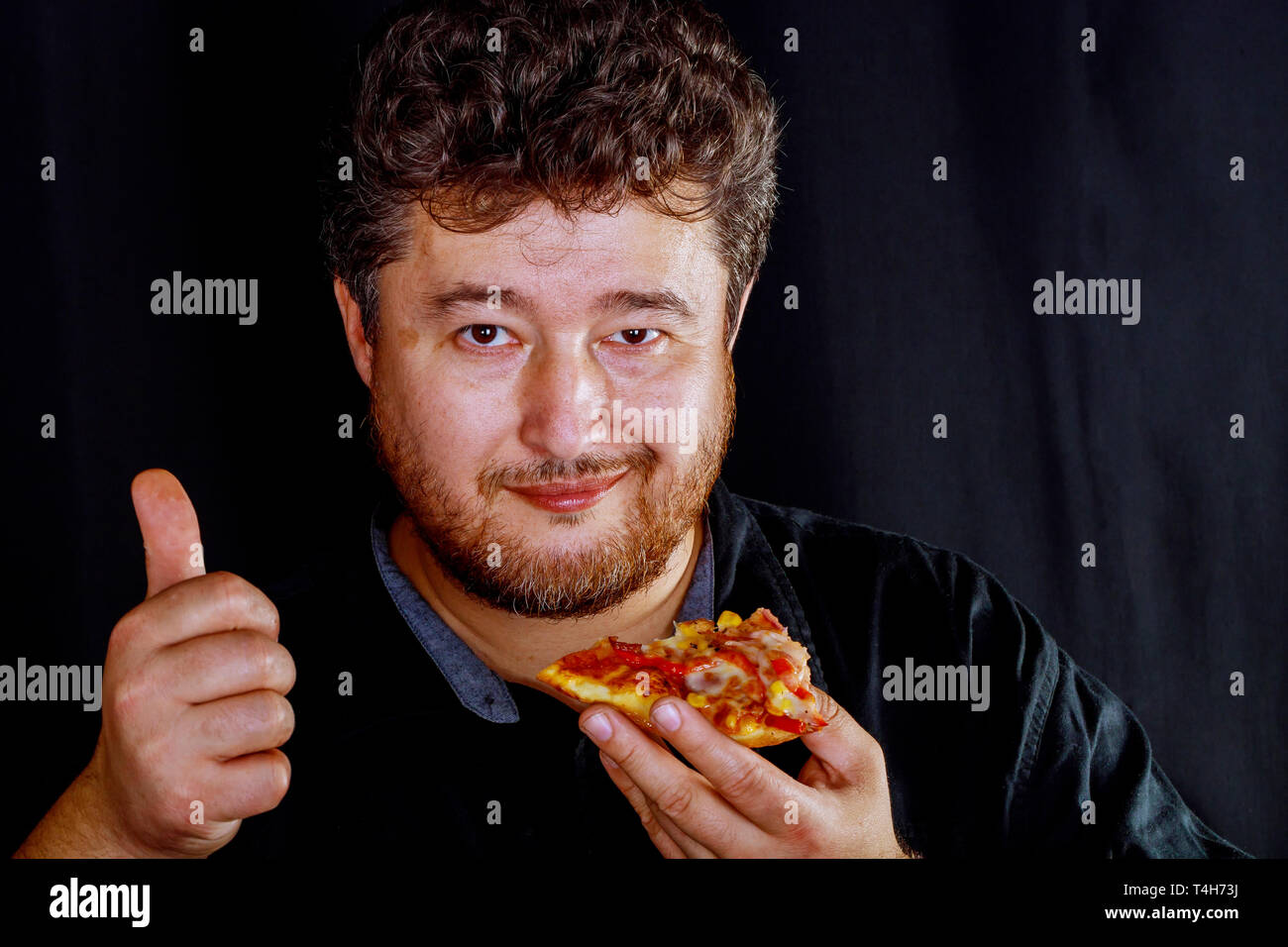 Man piece pizza in hi-res stock photography and images - Alamy