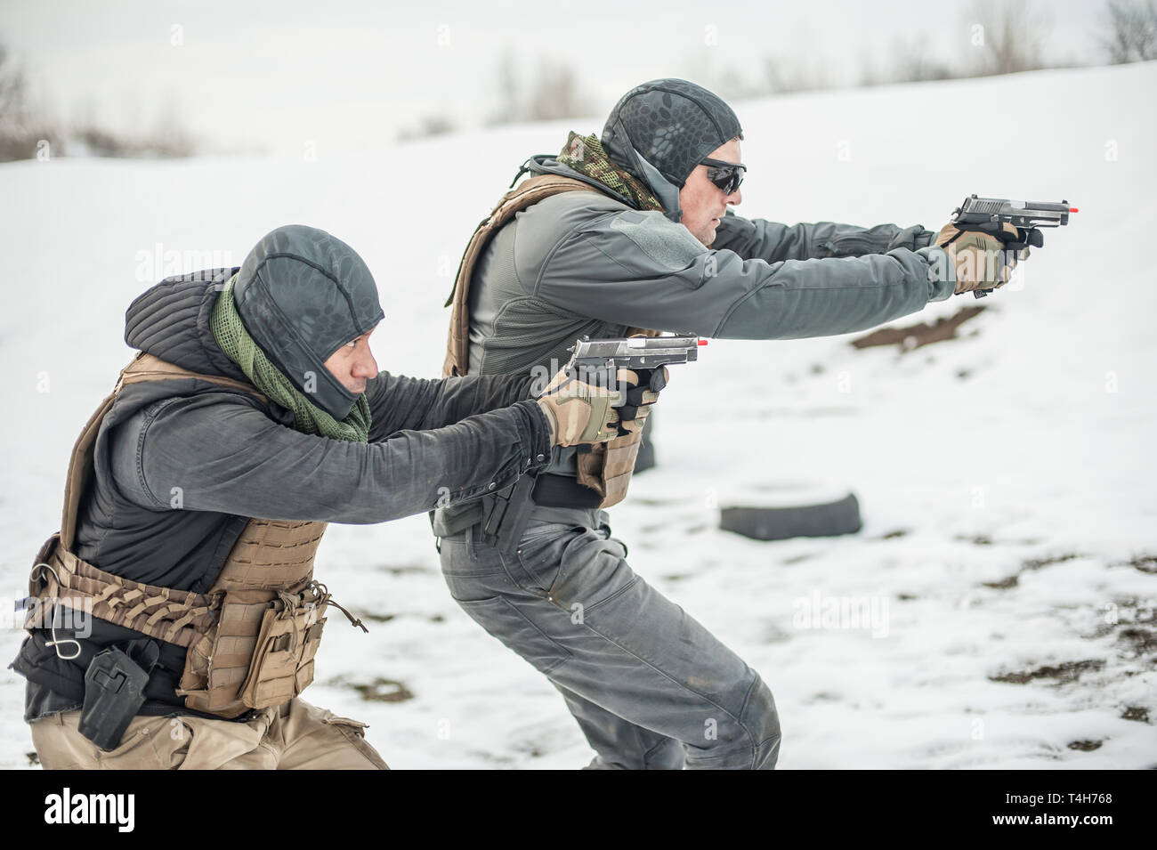 Two military and army special forces soldier have combat shooting ...