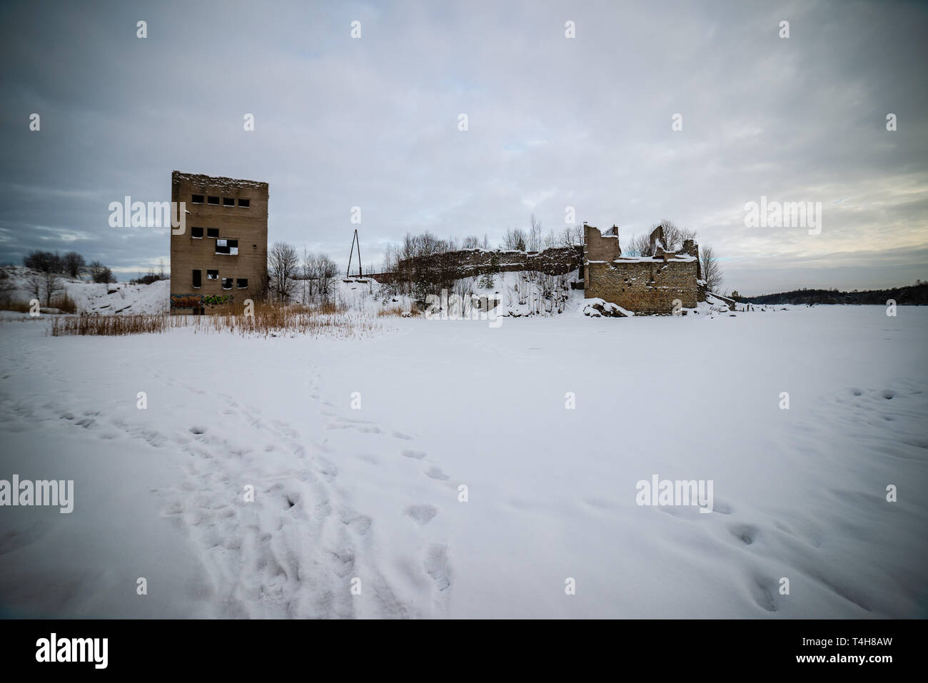 ruins of old white brick building for demolition Stock Photo - Alamy