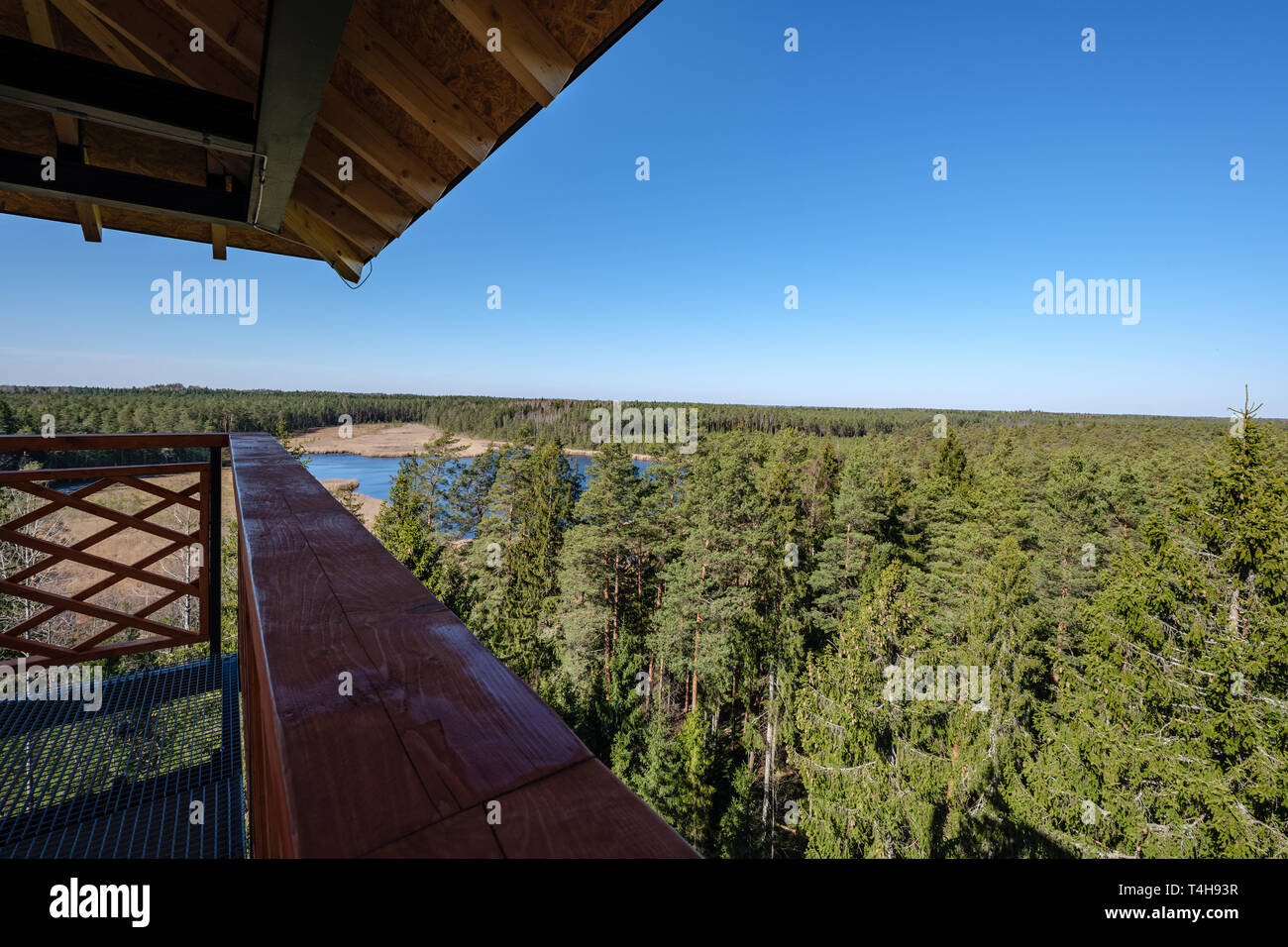 details of moder wooden and metal watchtower in forest countryside ...