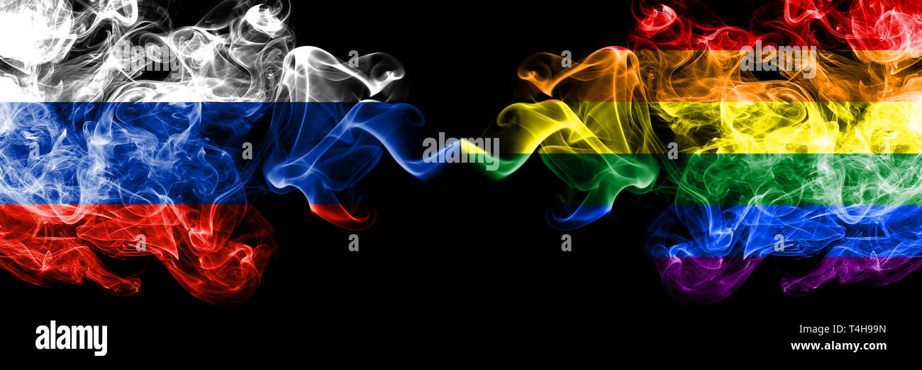 Russian vs Gay pride smoke flags placed side by side. Thick colored ...