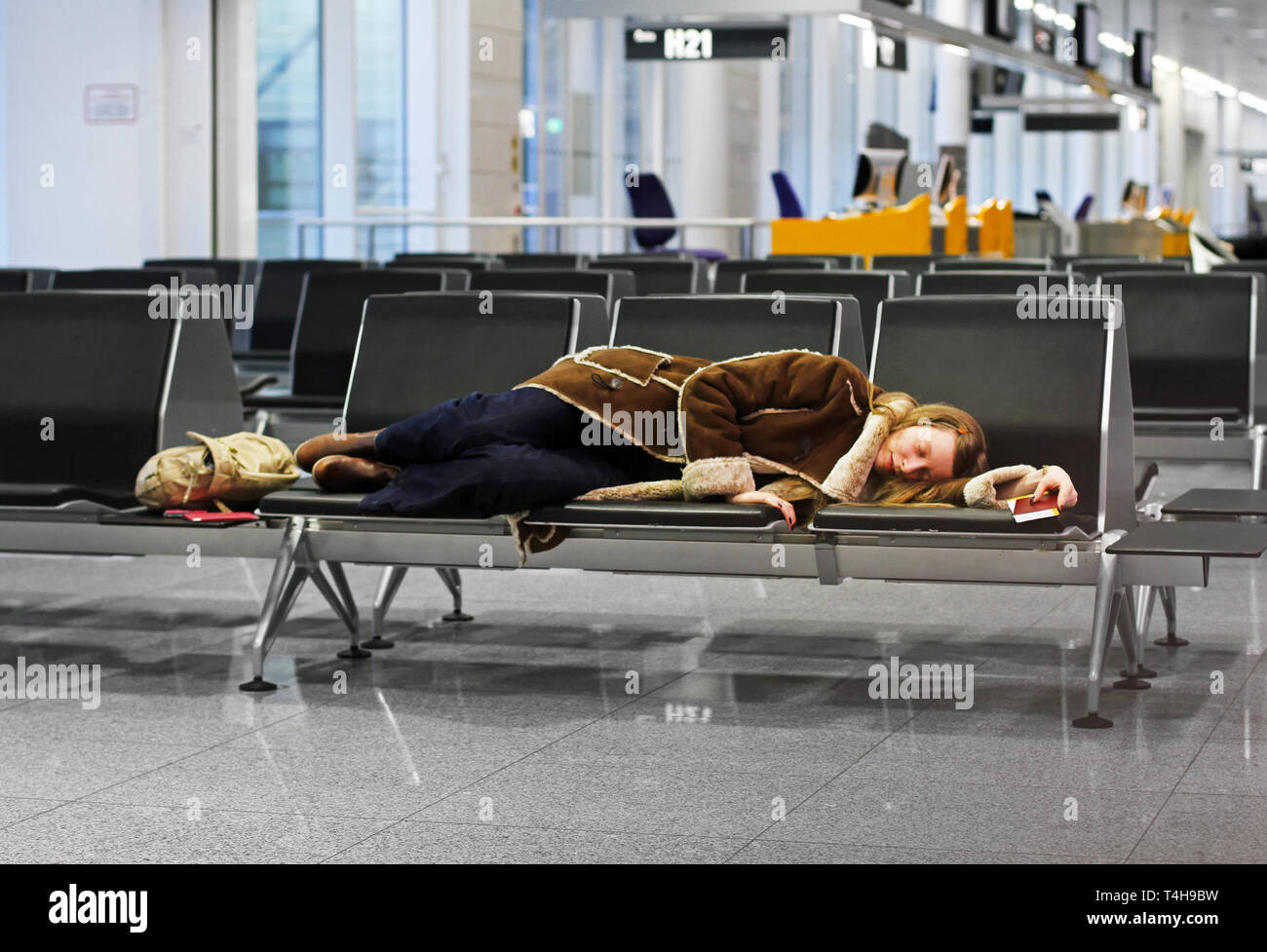 Passenger spending a night sleeping at airport after missing her flight ... Passenger spending a night sleeping at airport after missing her flight ...