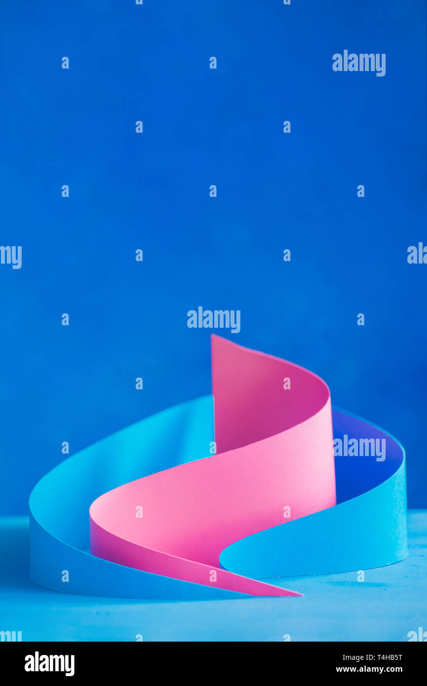 Papercraft shapes, pyramids, and curves in abstract paper sculpture ...