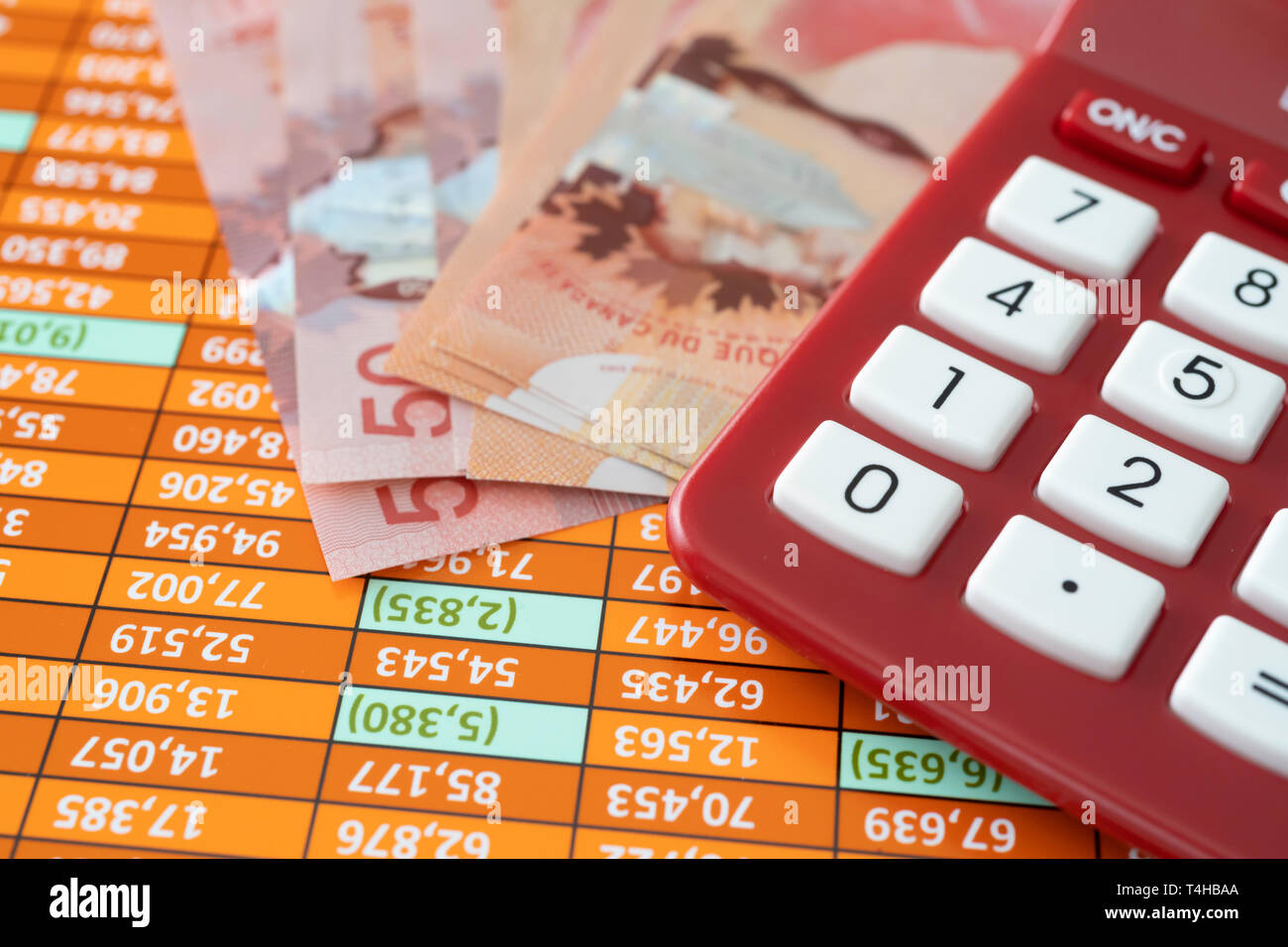 Canadian Dollar Notes On Spreadsheet With Calculator Stock Photo Alamy Canadian Dollar Notes On Spreadsheet With Calculator Stock Photo Alamy