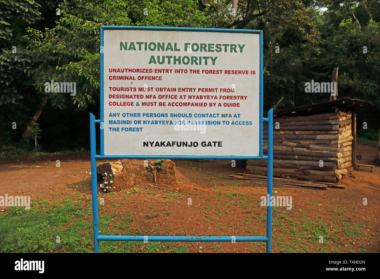 sign giving entry restrictions at park entrance Kibale Forest National ...