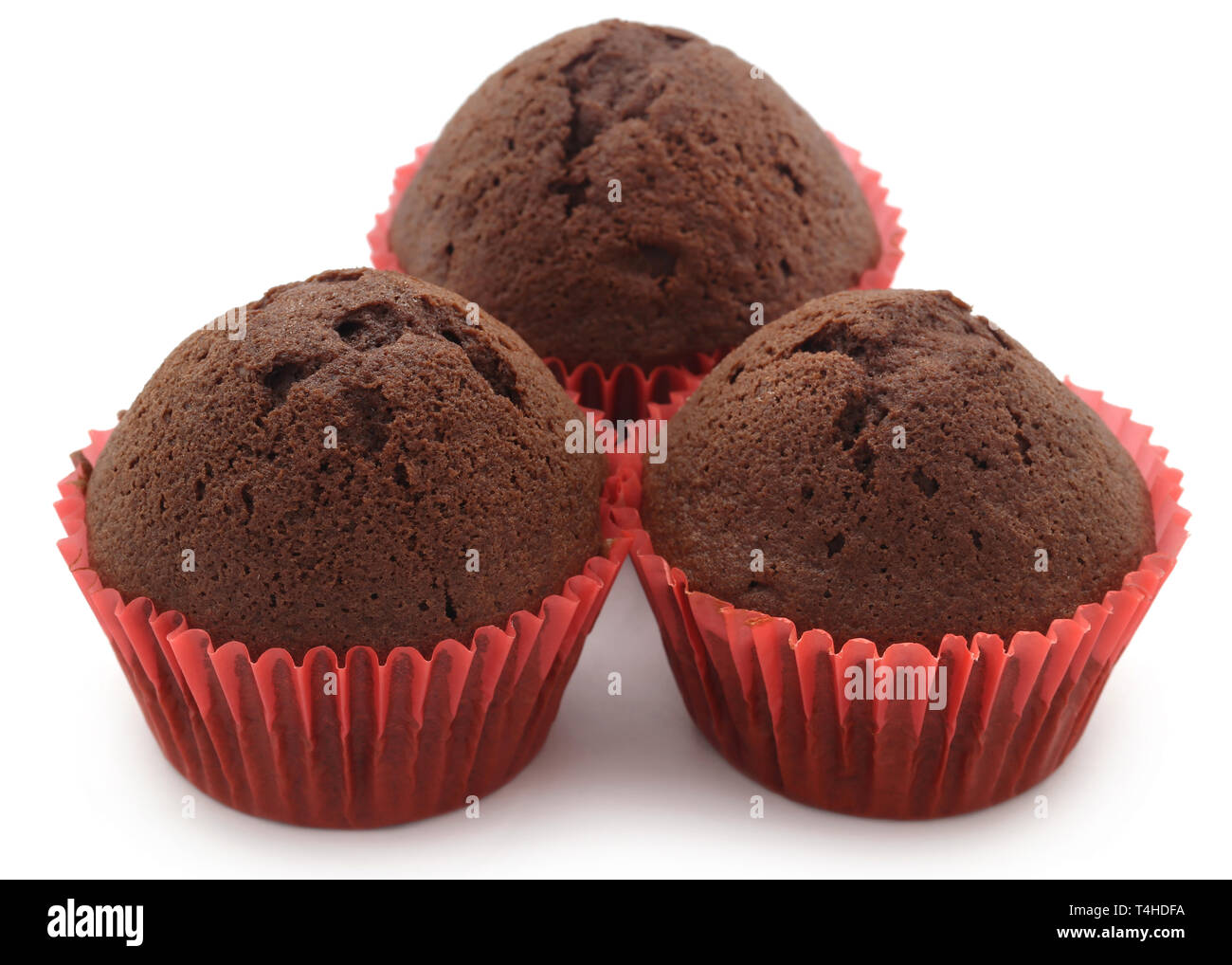 Freshly prepared homemade muffins over white background Stock Photo - Alamy
